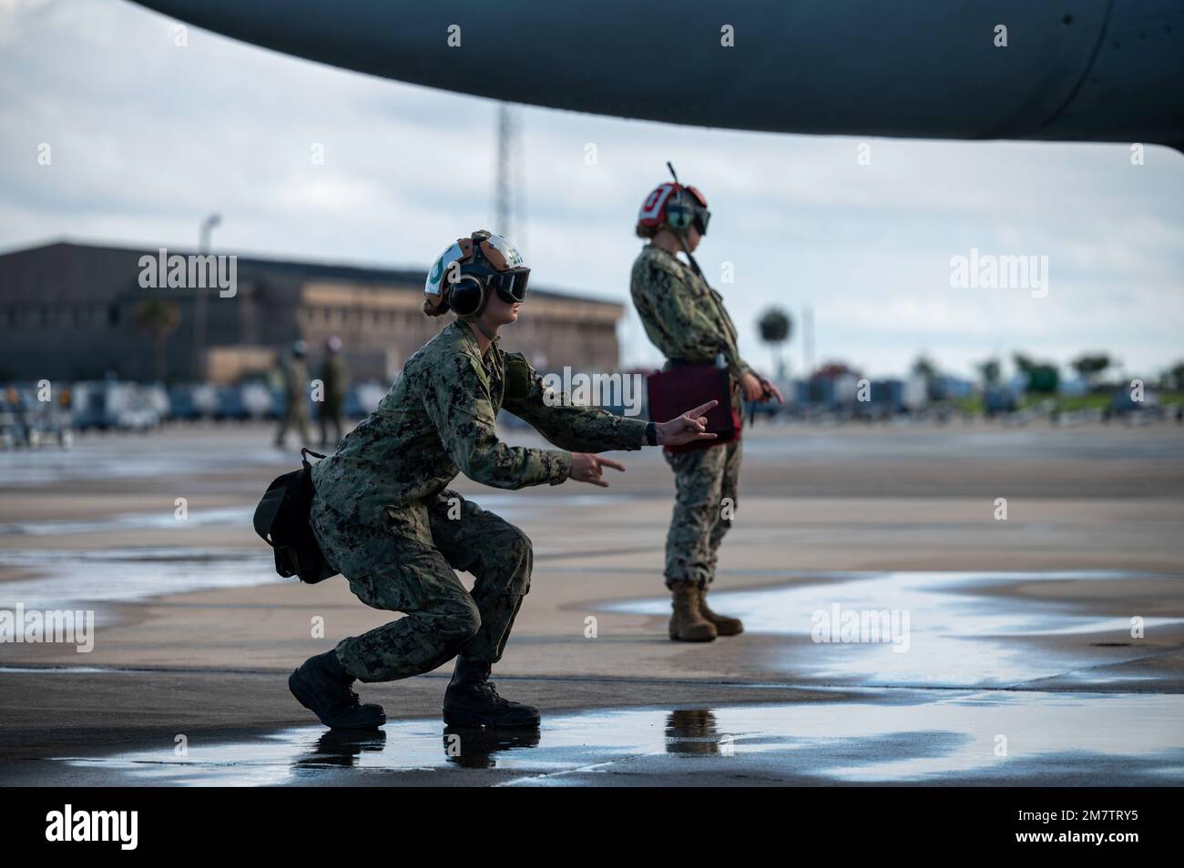 U.S. Navy Seaman Korina Murphy, Strike Fighter Squadron (VFA) 105 plane ...
