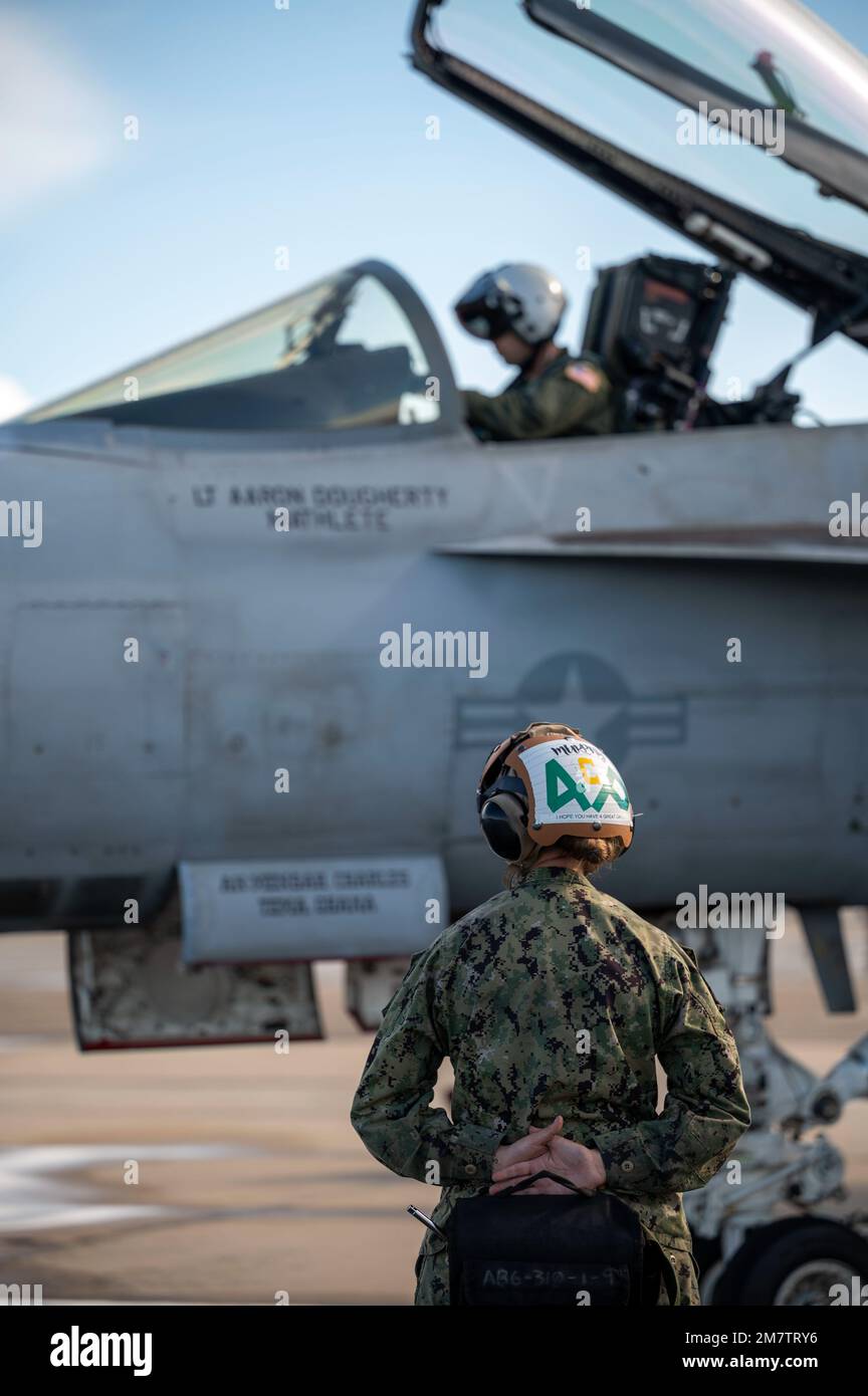 U.S. Navy Seaman Korina Murphy, Strike Fighter Squadron (VFA) 105 plane ...
