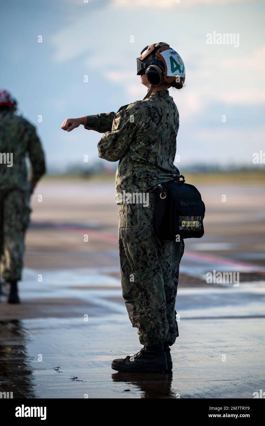 U.S. Navy Seaman Korina Murphy, Strike Fighter Squadron (VFA) 105 plane ...