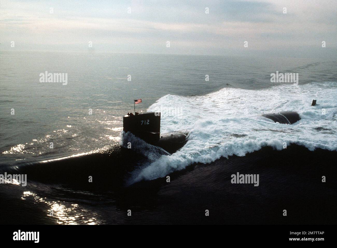 An aerial port bow view of the nuclear-powered attack submarine USS ...