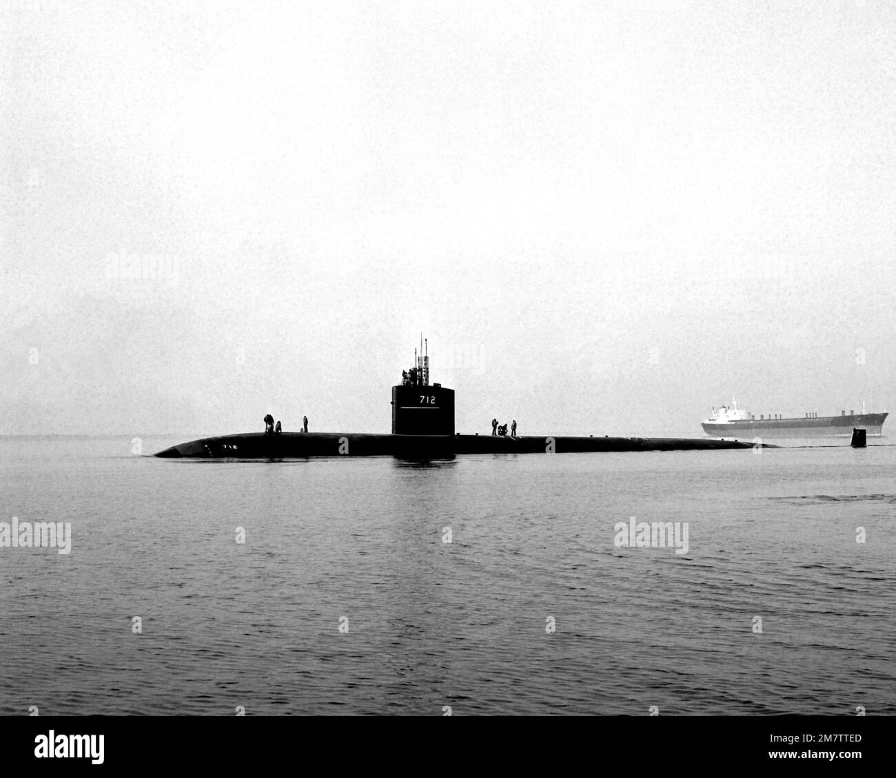 An aerial port beam view of the nuclear-powered attack submarine USS ...