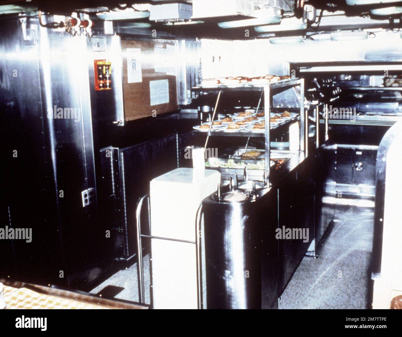 A view of the salad and dessert bar in the crew's mess deck aboard the ...