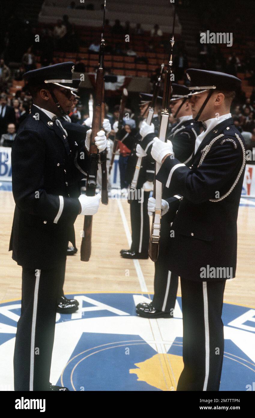The Air Force Honor Guard Drill Team performs during half-time at the ...