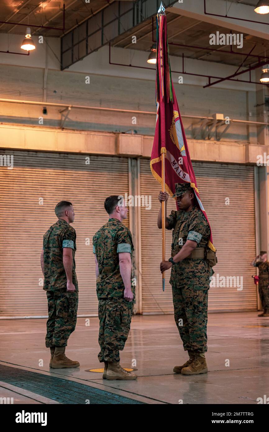 U.S. Marine Corps Lt. Col. Matthew Haley, middle, the outgoing ...