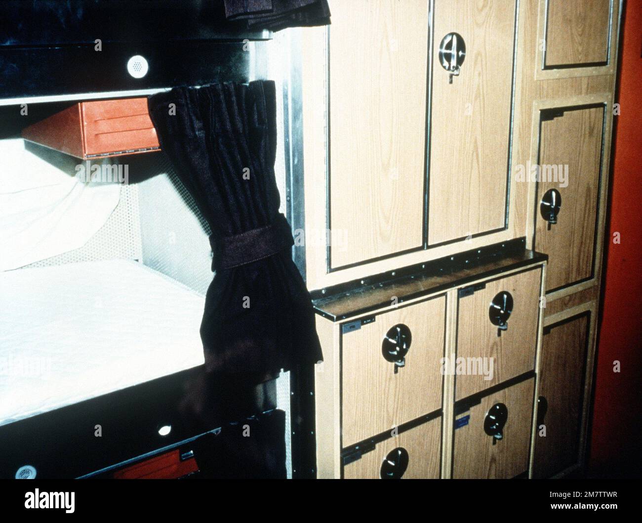 A partial view of a bunk room, shared by nine crewmen aboard the ...