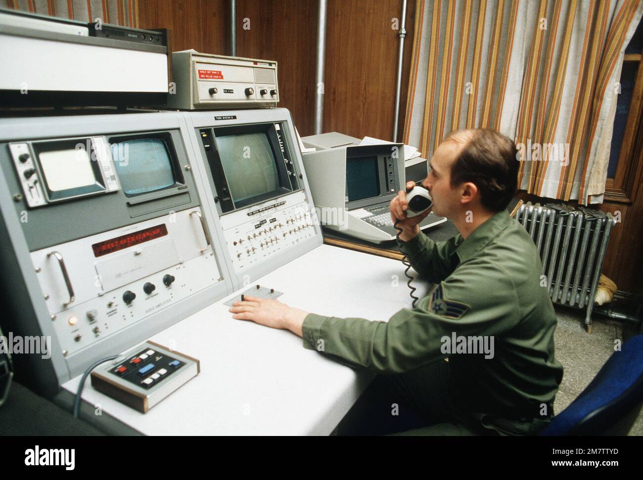 SGT Wayne Wolf, 2146th Communication Squadron, operates a television ...