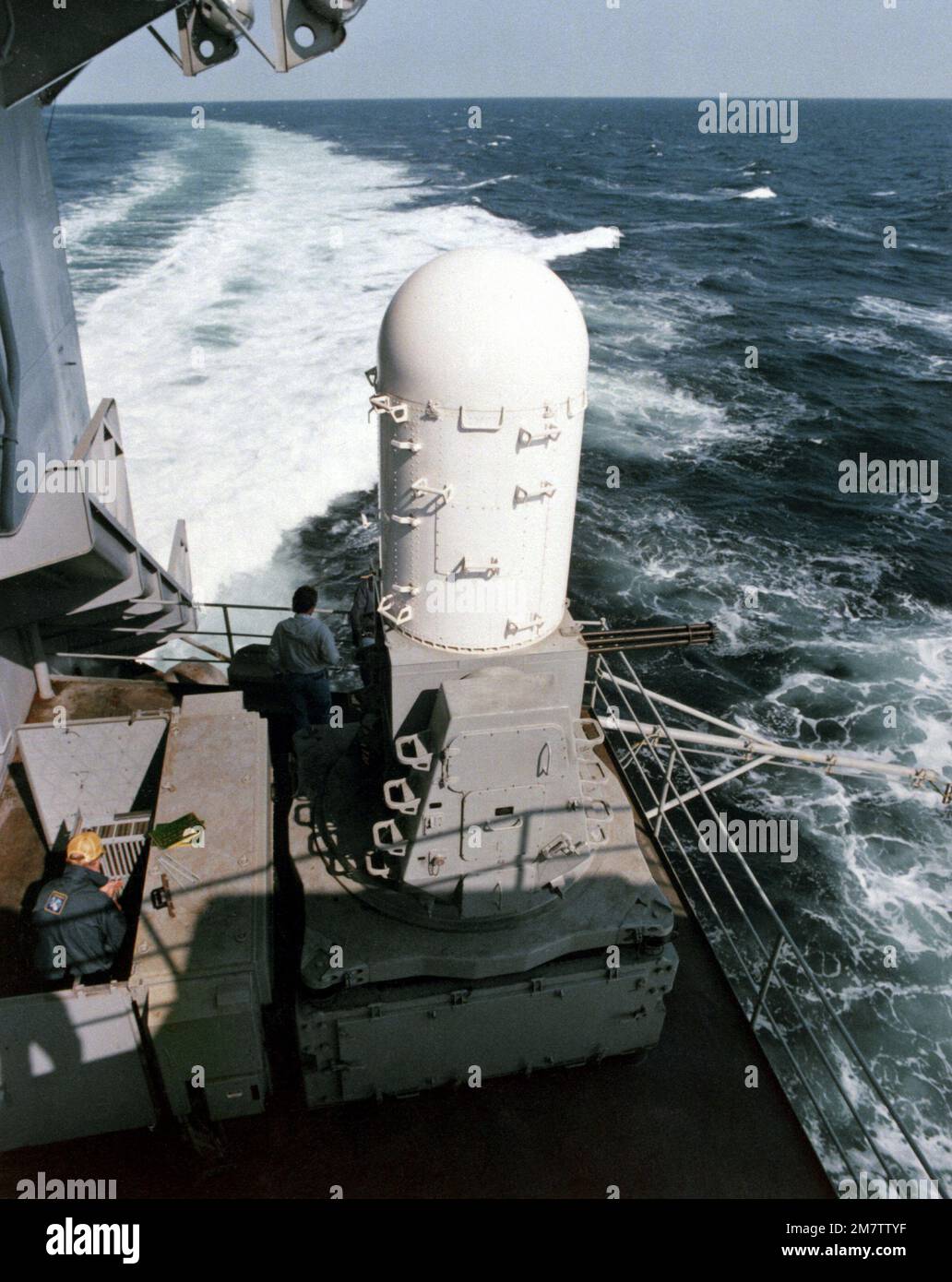 A right side view of one of three Mark 15 (3X1) Phalanx weapons systems ...