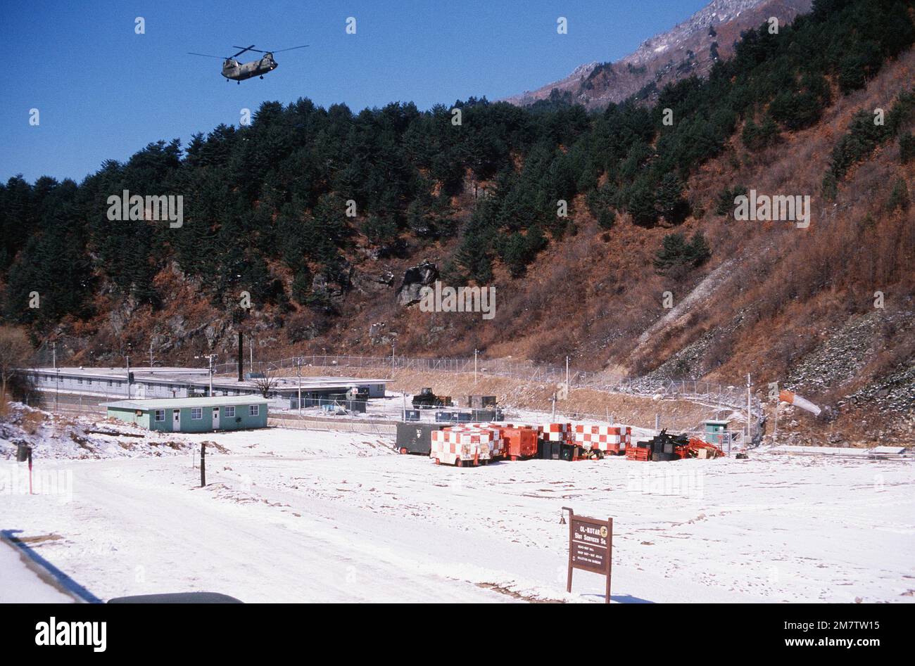 A U.S. Army CH-47 Chinook helicopter delivers supplies to the base ...