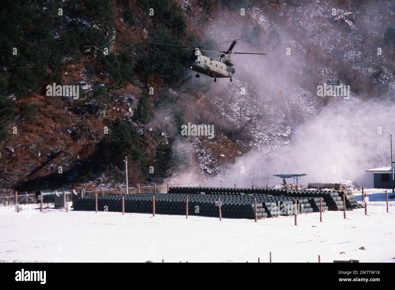 A U.S. Army CH-47 Chinook helicopter delivers supplies to the base ...
