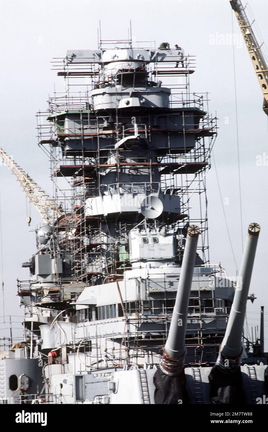 A bow view of the superstructure of the battleship USS NEW JERSEY (BB-62), surrounded by ...