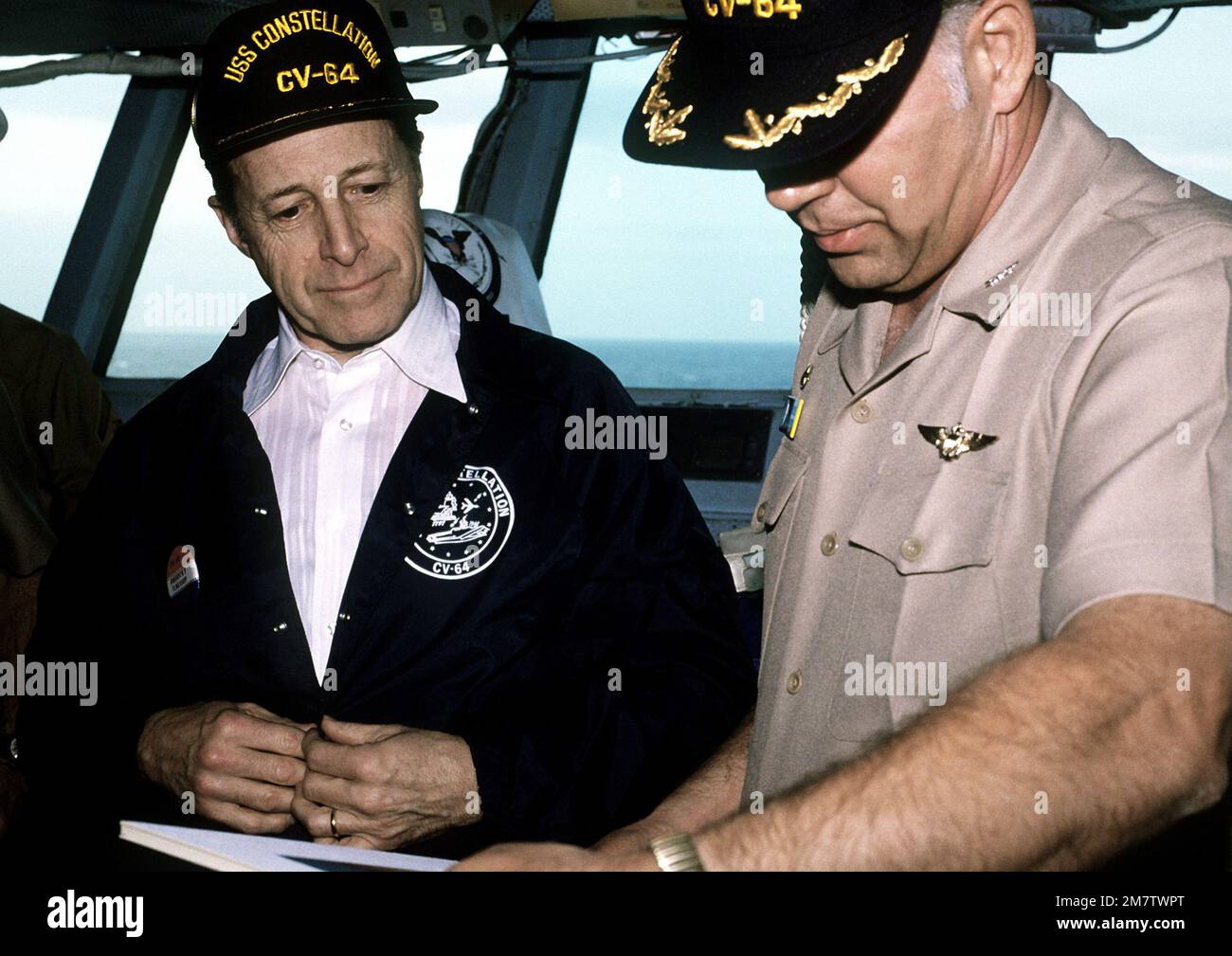 CAPT D.M. Brooks, commanding officer, briefs Secretary of Defense ...