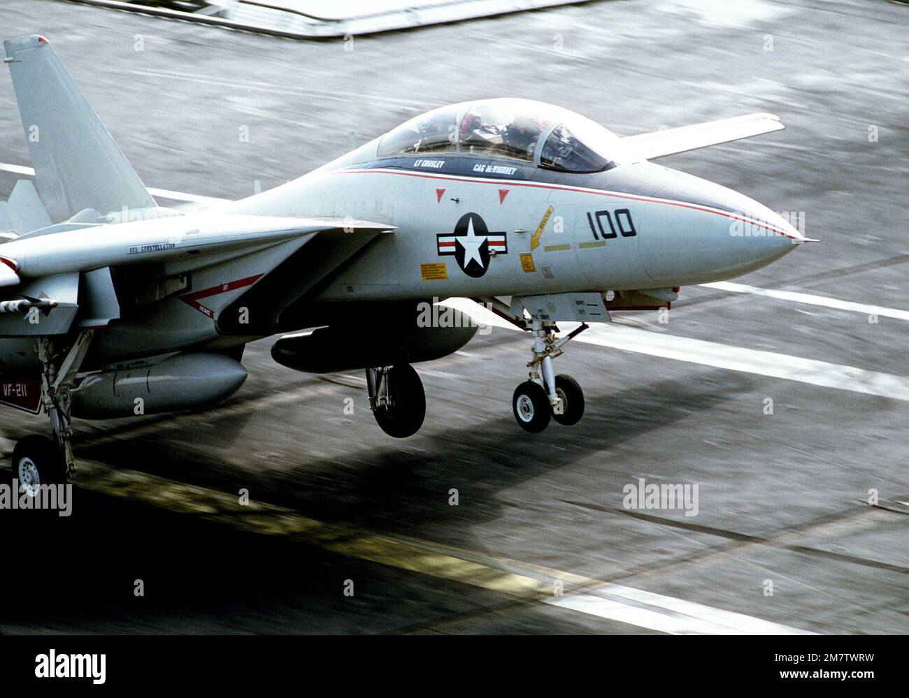 An F-14 Tomcat aircraft from Fighter Squadron 211 (VF-211) lands aboard ...
