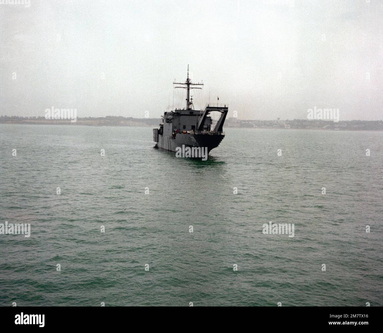 A starboard view of the tank landing ship USS NEWPORT (LST-1179 ...