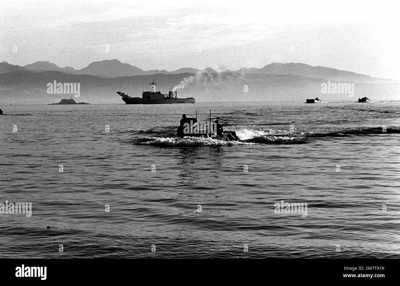 A Marine Corps LVTP-7 personnel tracked landing vehicle, approaches a ...