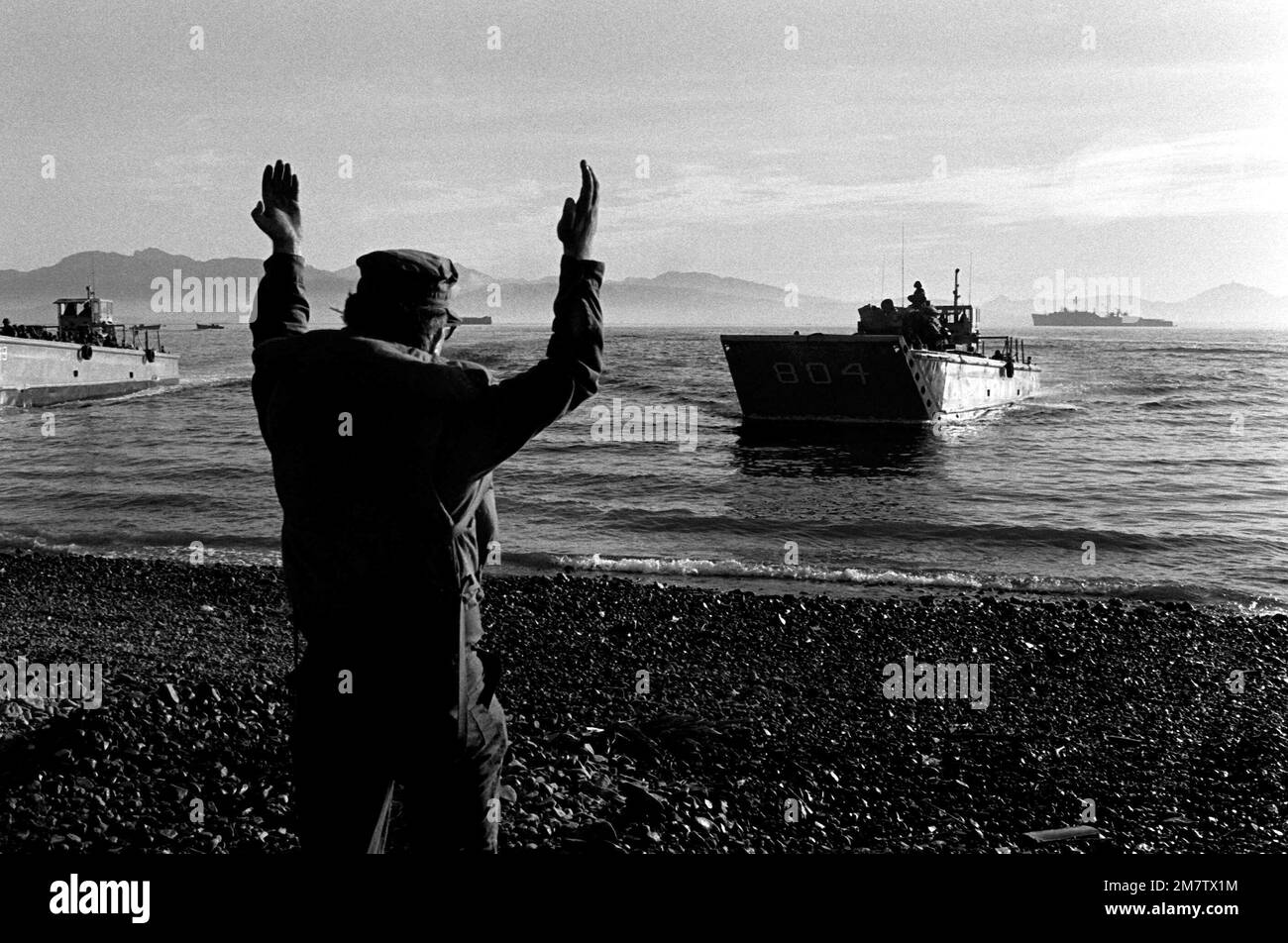 A mechanized landing craft (LCM 8), carring an M-60 main battle tank ...