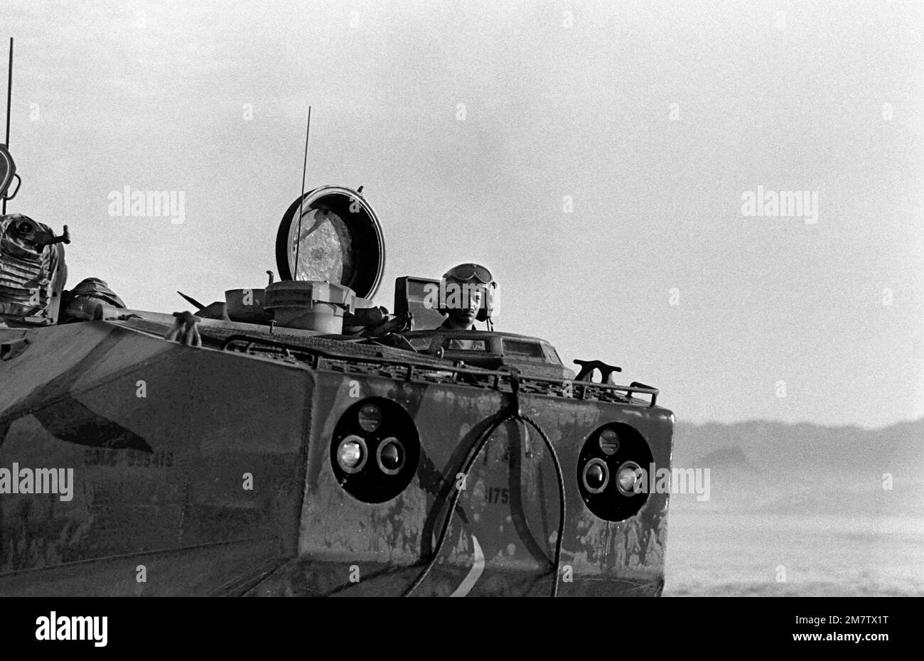 A Marine Coprs LVTP-7 personnel tracked landing vehicle, maneuvers on ...