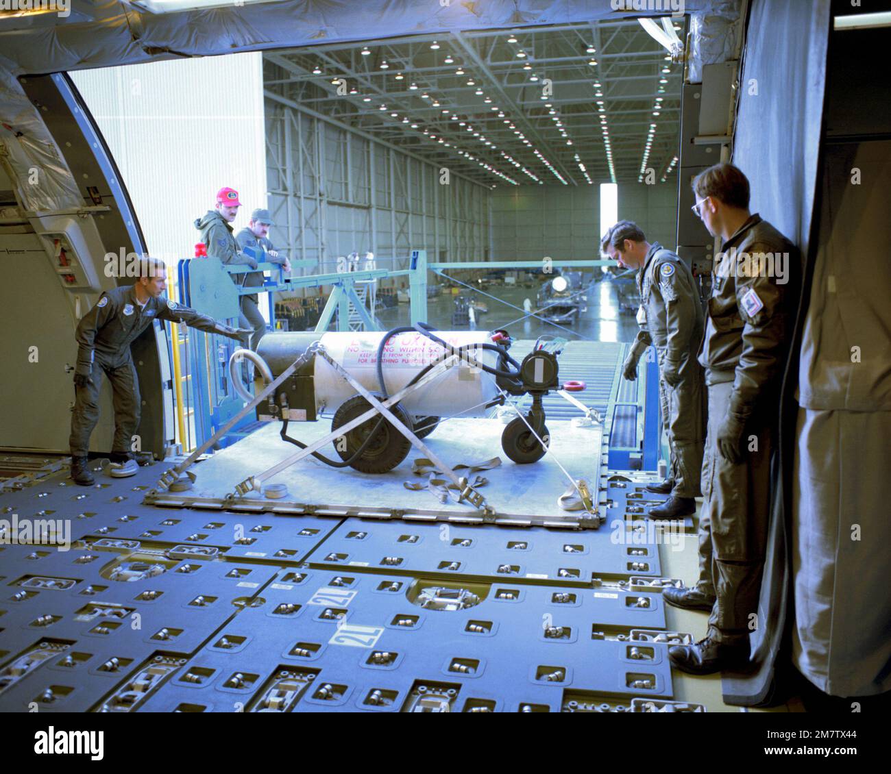 A cargo loading demonstration is given aboard a KC-10A Extender ...
