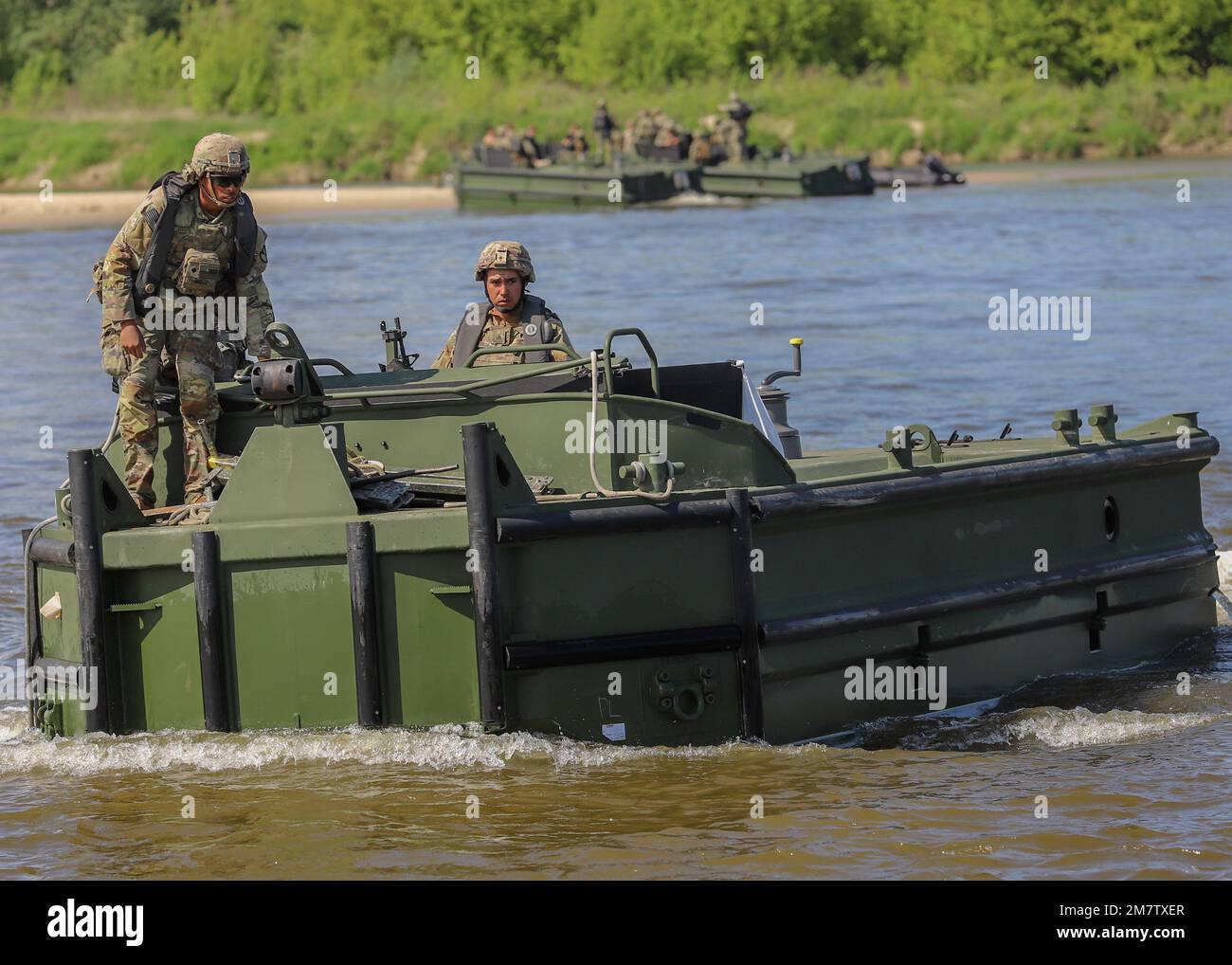 U.S. Soldiers cross the Vistula river to start transporting allies and ...