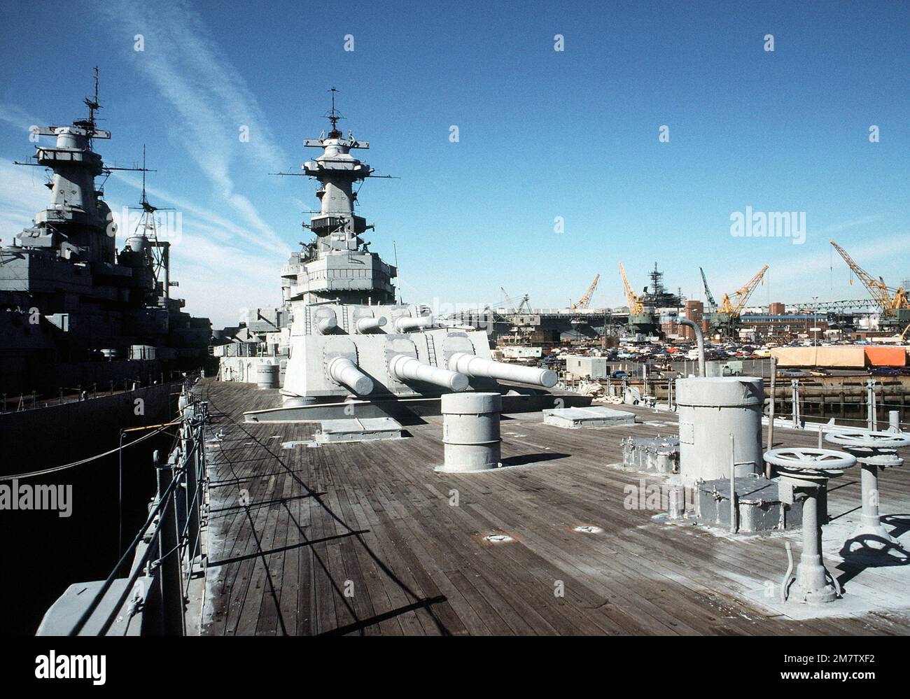 A view from forward looking aft at No.s 1 and 2 16-inch/50-caliber gun ...
