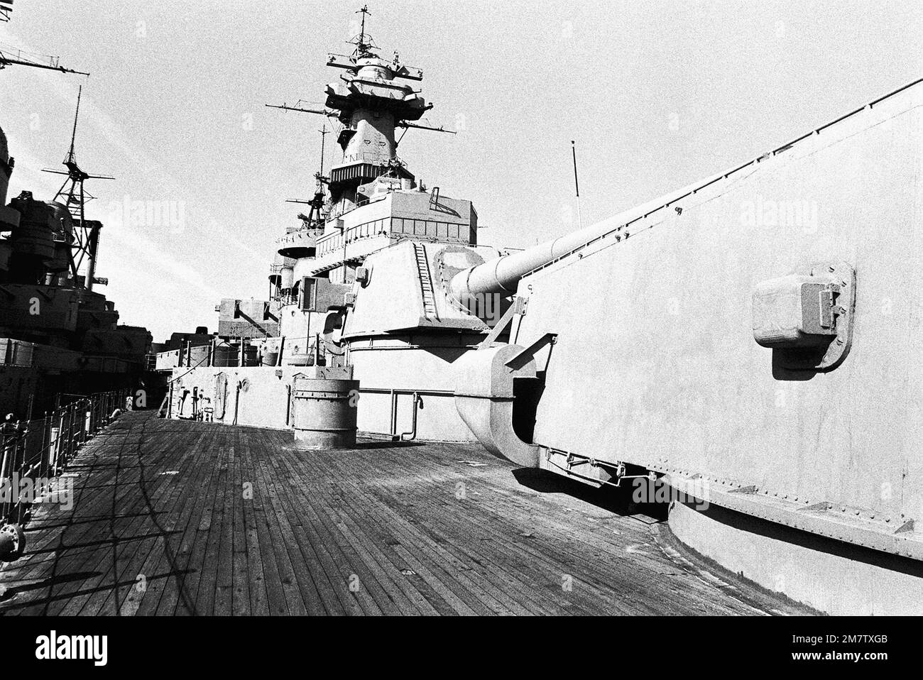 A view from the bow of "B" turret, the bridge and a 5-inch/38-caliber ...