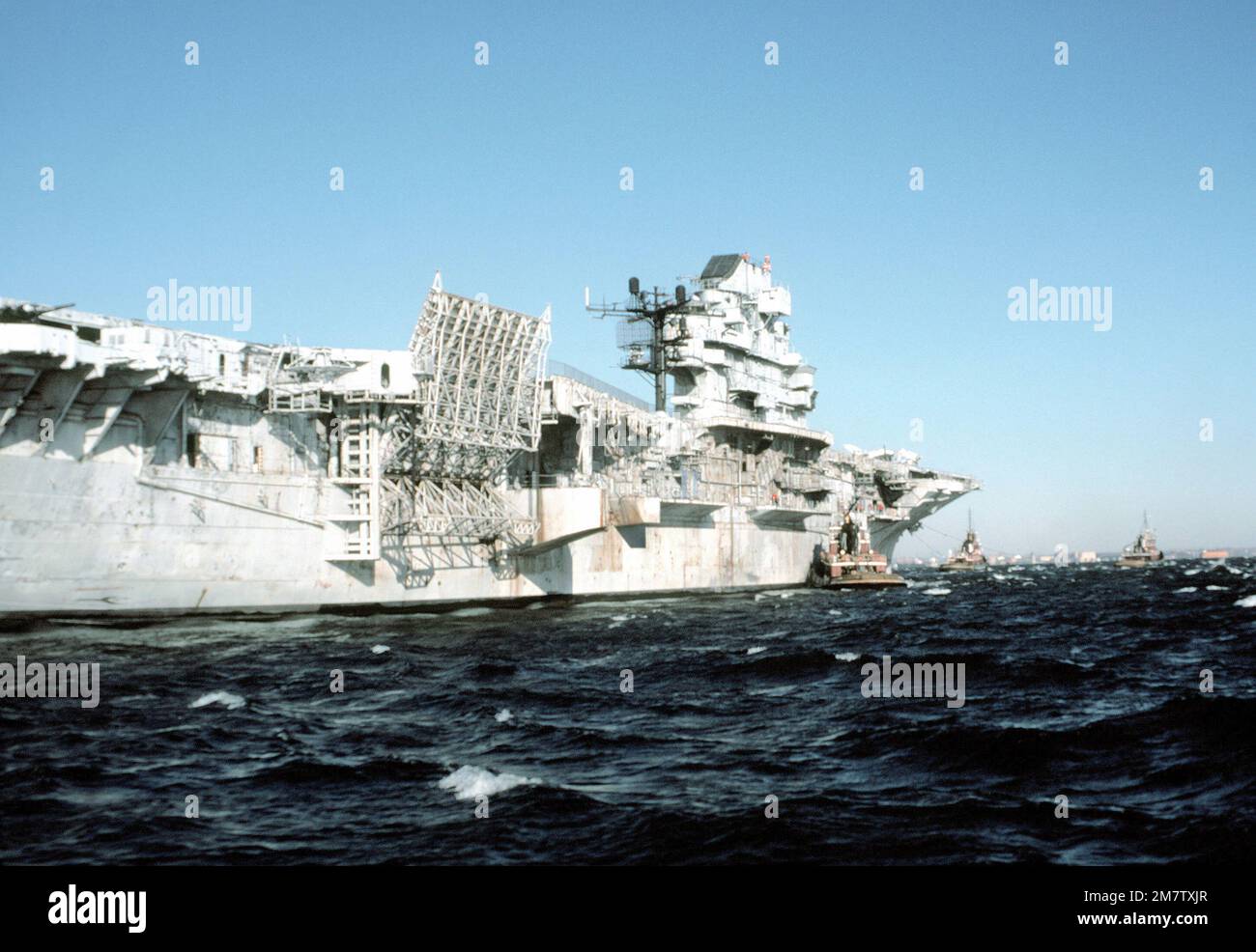 A starboard quarter view of the aircraft carrier ex-USS INTREPID (CVS ...