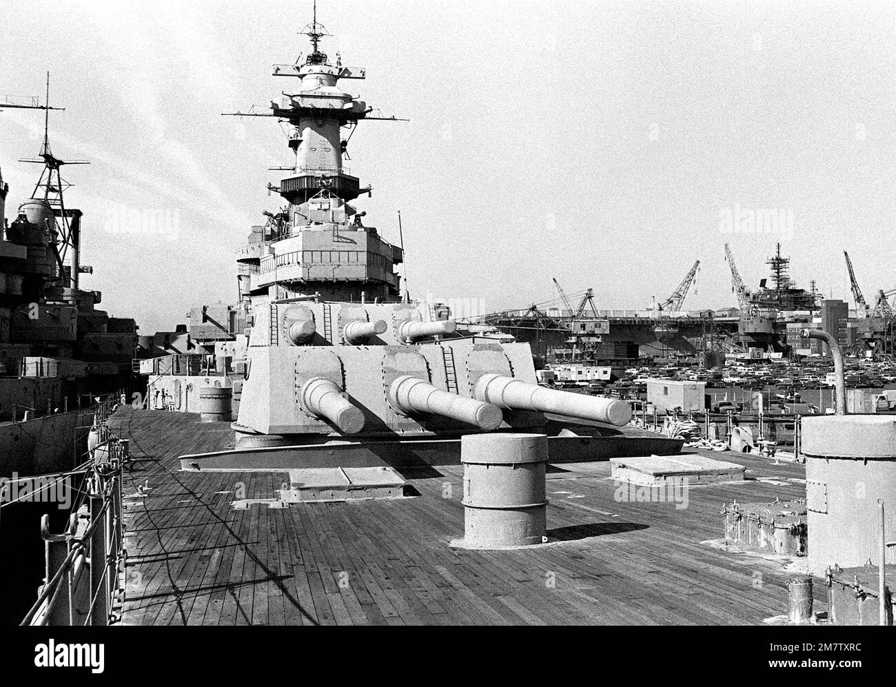A view from the starboard bow looking aft at "A" and "B" turrets and ...