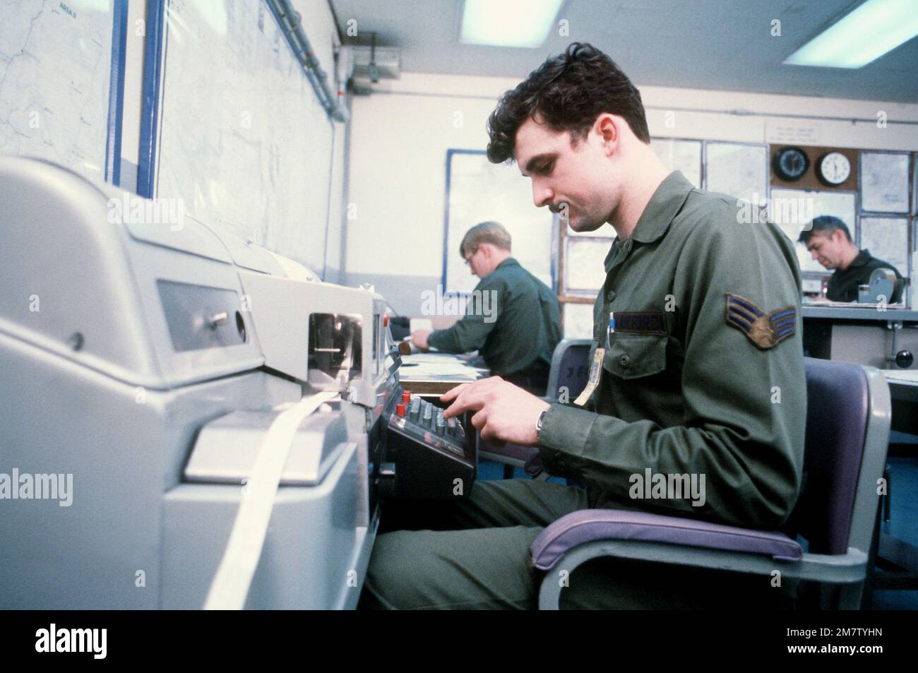 SRA Scott operates a teletype machine at Headquarters Tactical Air ...