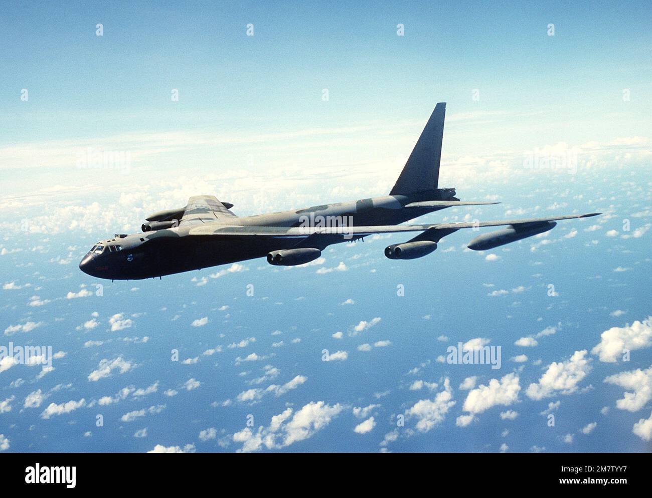 Left side view of a B-52 Stratofortress aircraft in-flight during ...