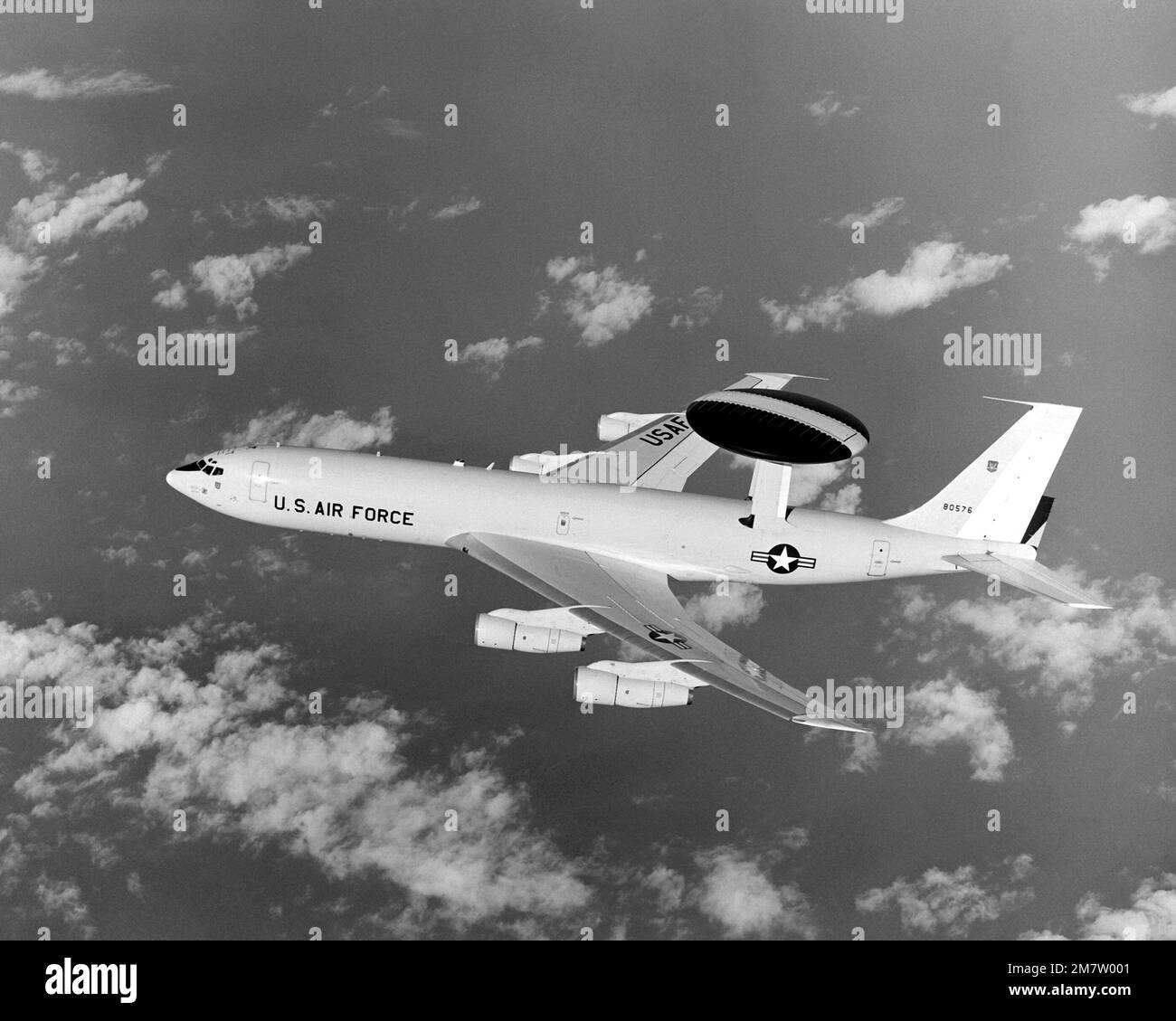 An air-to-air left side view of an E-3A Sentry aircraft, one of many ...