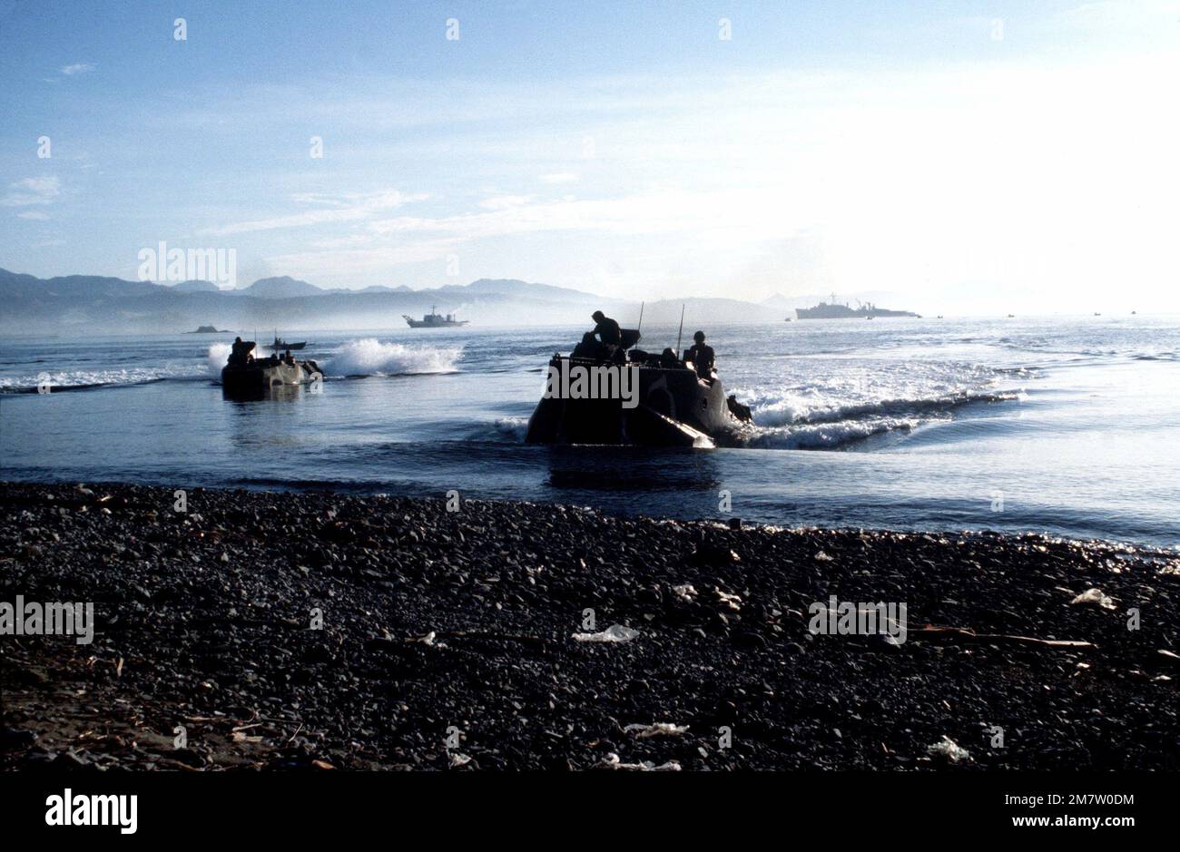 Marines of the 31st Marine Amphibious Unit approach Green Beach aboard ...