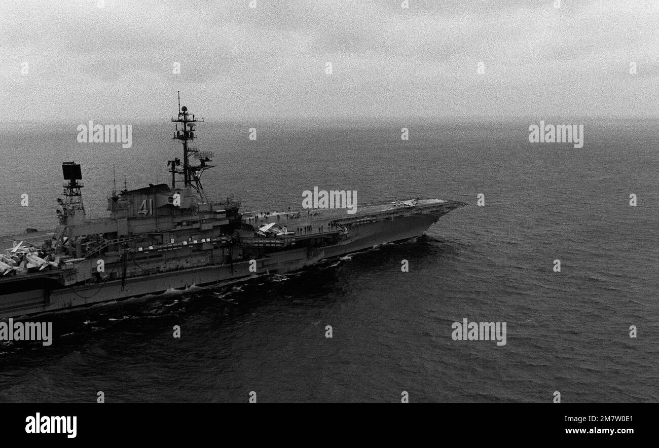 A starboard quarter view of the aircraft carrier USS MIDWAY (CV 41 ...