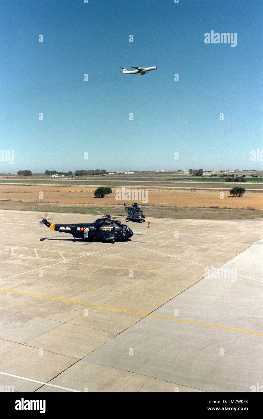 A right side view of a parked Spanish SH-3 Sea King helicopter. Base ...
