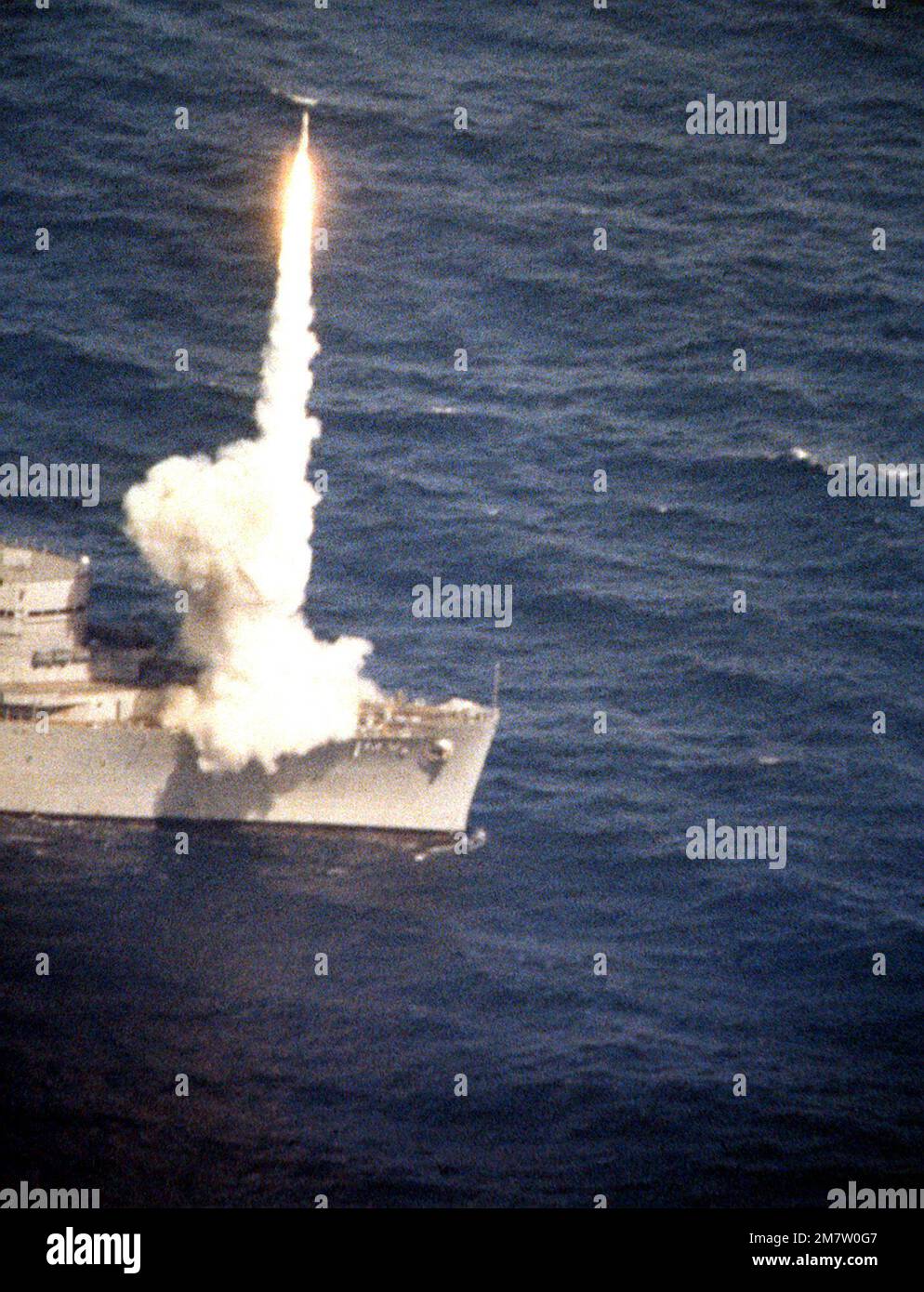 An Aegis missile is launched from a vertical launch system (VLS) aboard ...