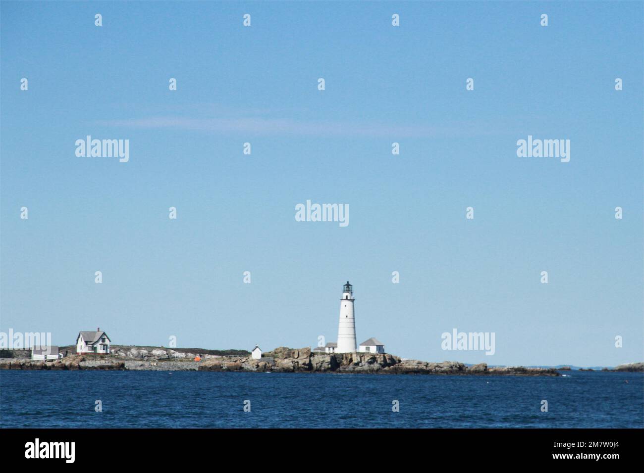 The Boston Light lighthouse at Little Brewster island in Boston Harbor ...
