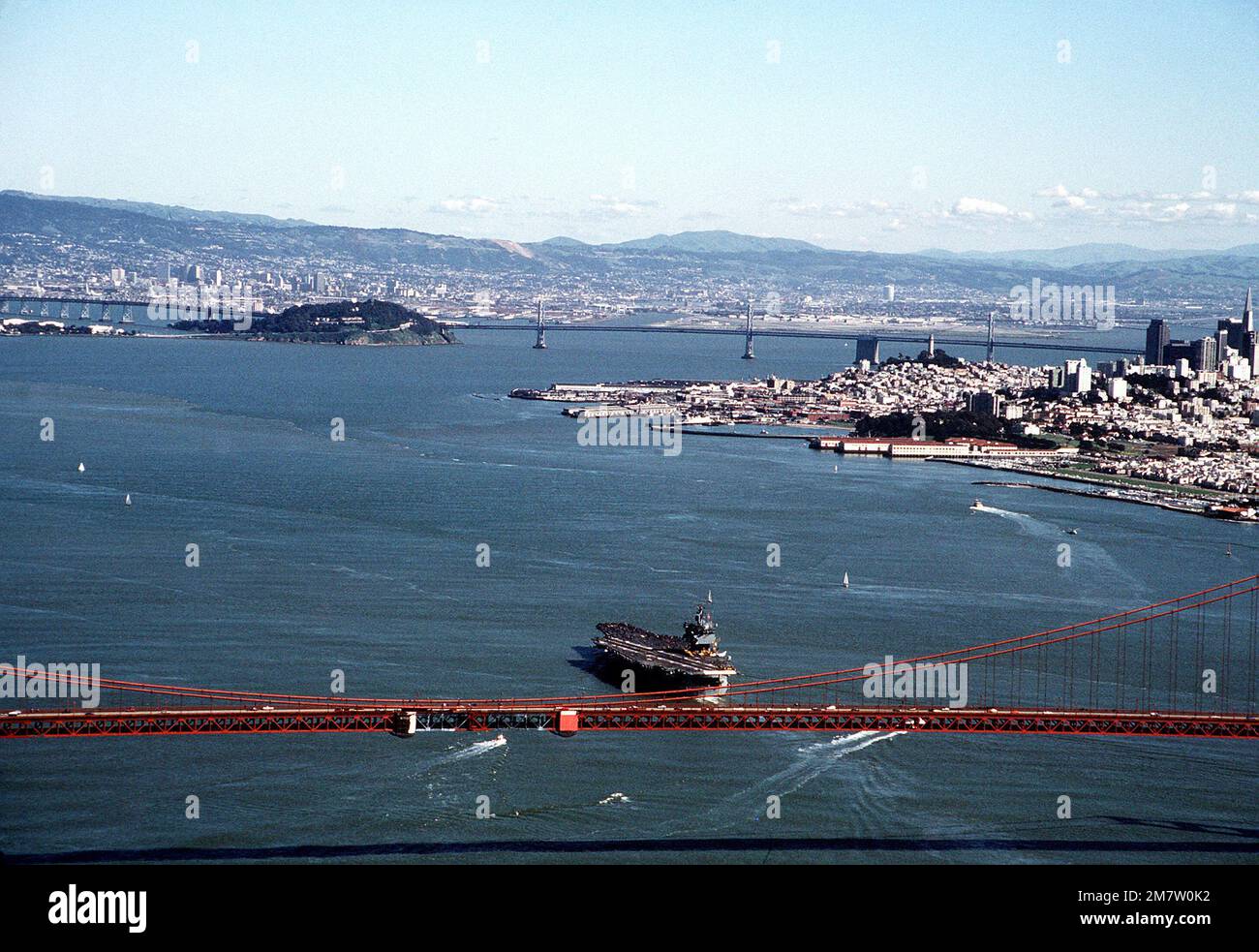 An aerial port quarter view of the nuclear-powered aircraft carrier USS ...