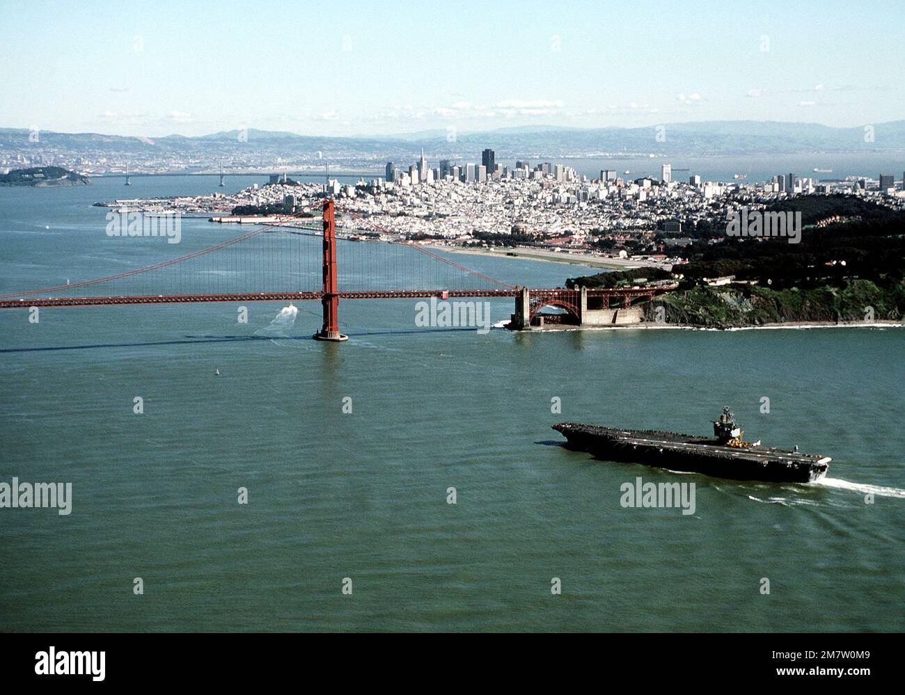 A port quarter view of the nuclear-powered aircraft carrier USS ...