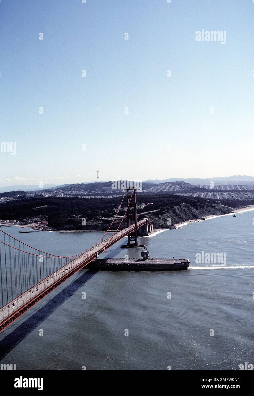 An aerial port beam view of the nuclear-powered aircraft carrier USS ...