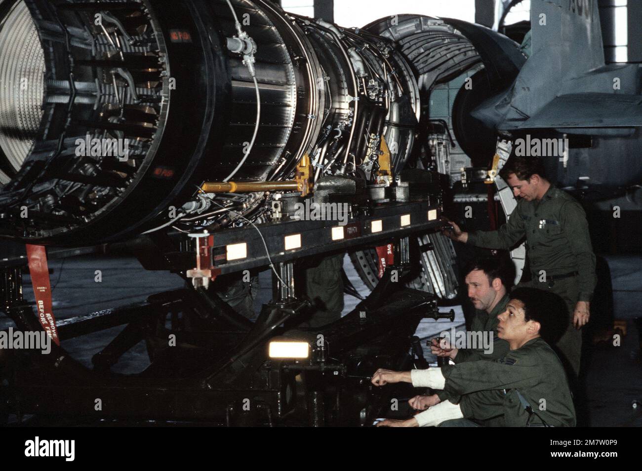 Three U.S. Air Force members of the 53rd Aircraft Maintenance Crew ...