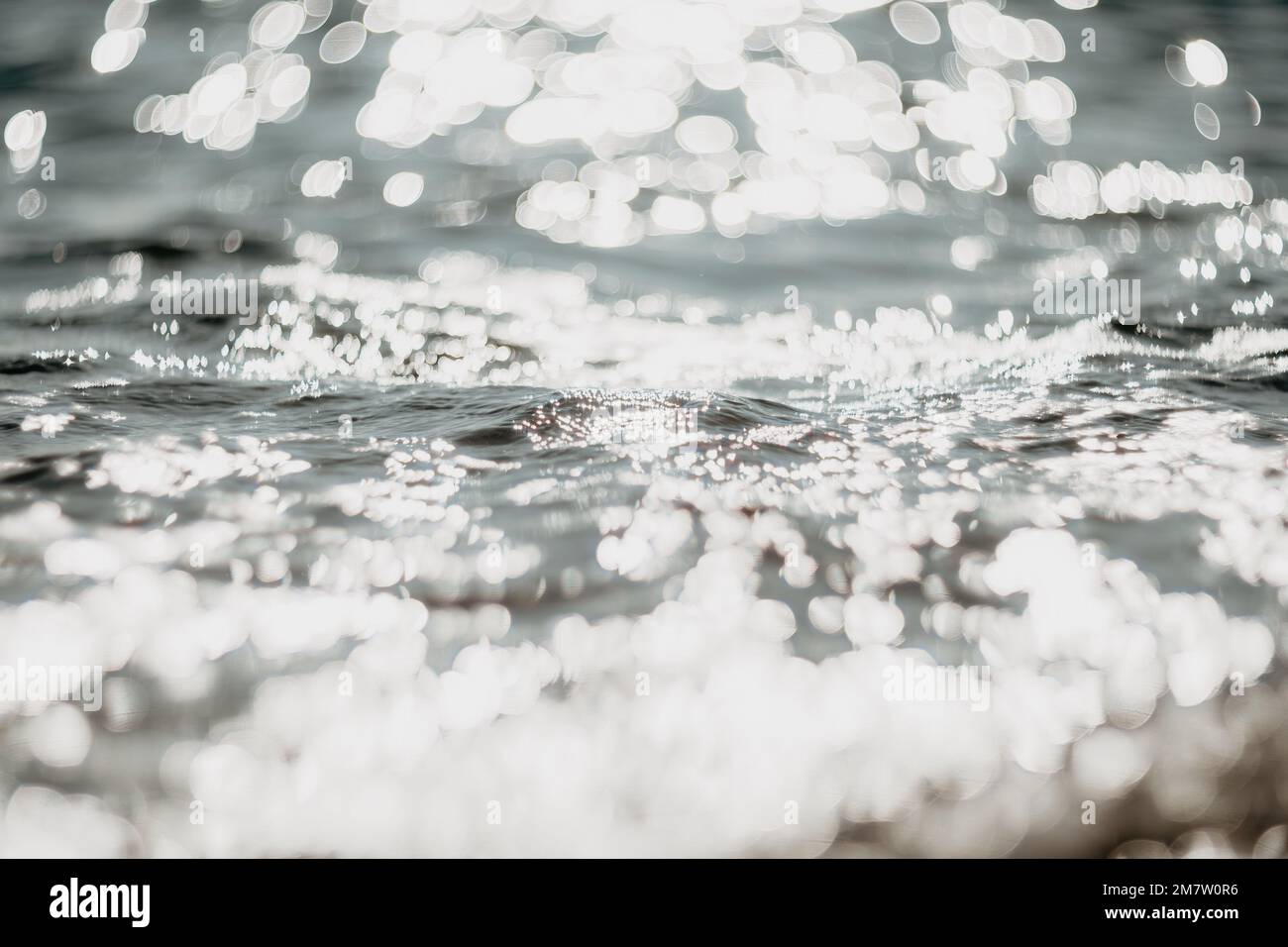 Abstract sea summer ocean sunset nature background. Small waves on ...