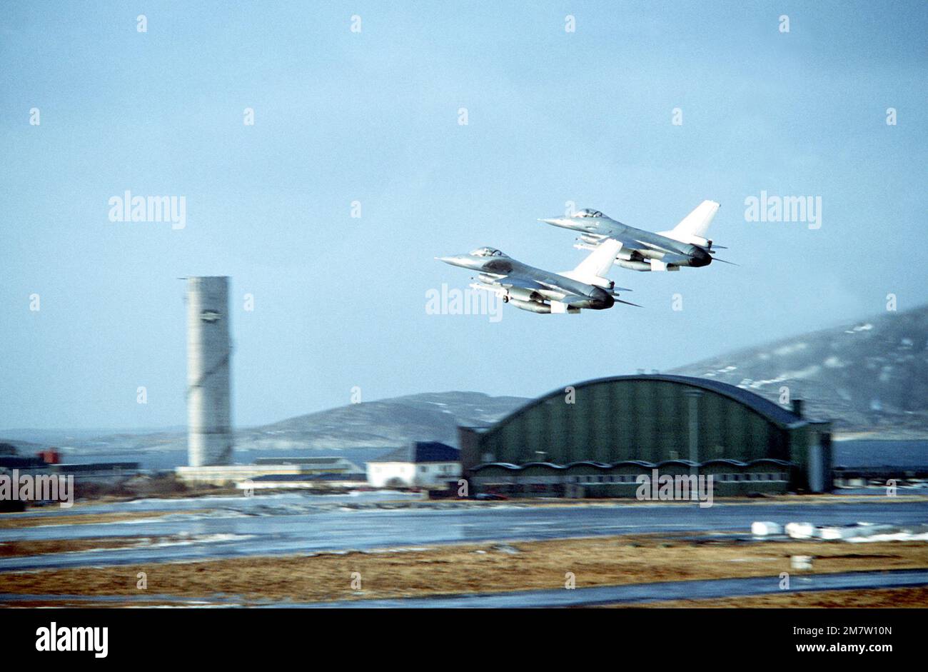 Two Norwegian F-16A Fighting Falcon aircraft take off together in ...