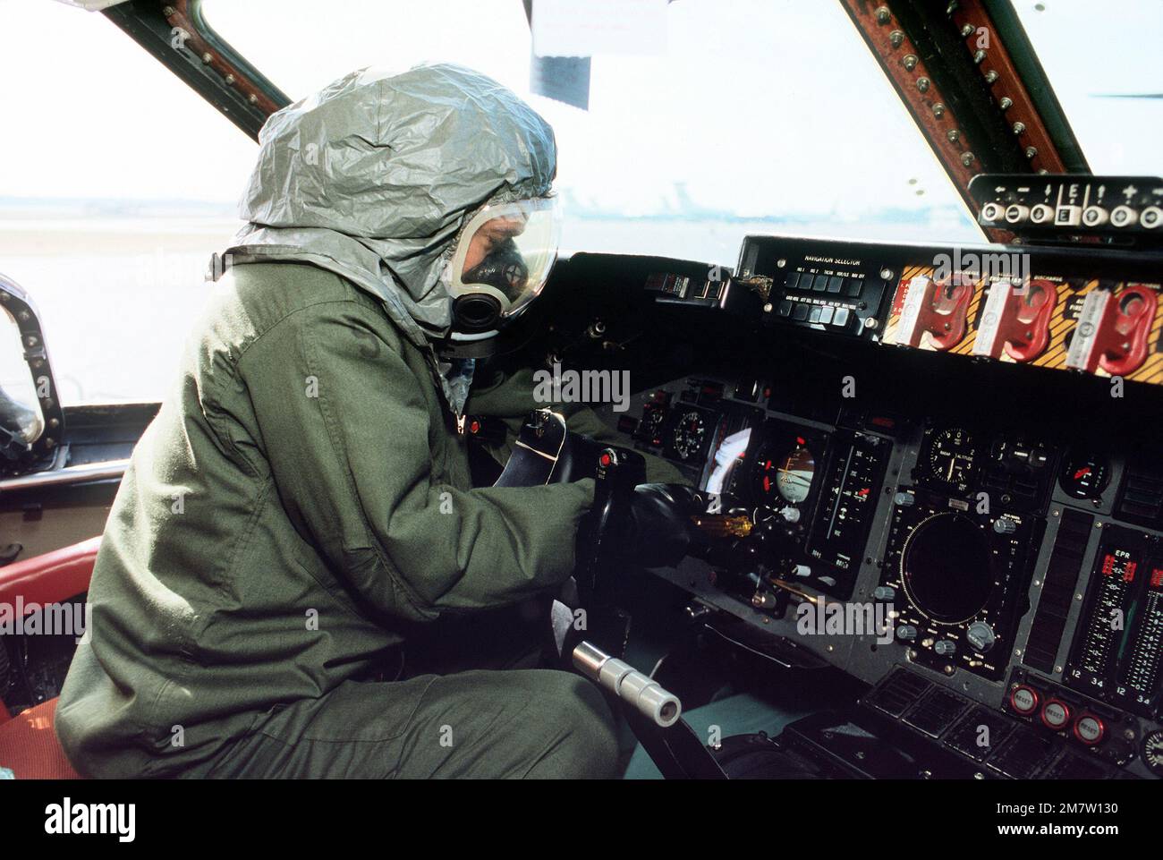 Maintenance Personnel Perform A Cockpit Preflight Check In A C 141b