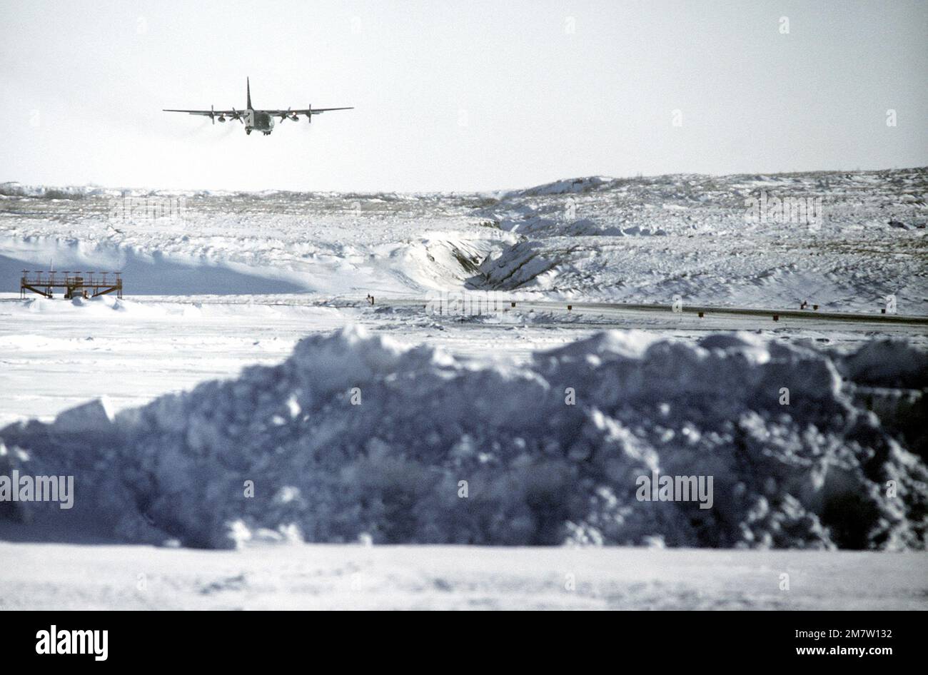 Rear view of a C-130 Hercules aircraft taking off during exercise Cool ...