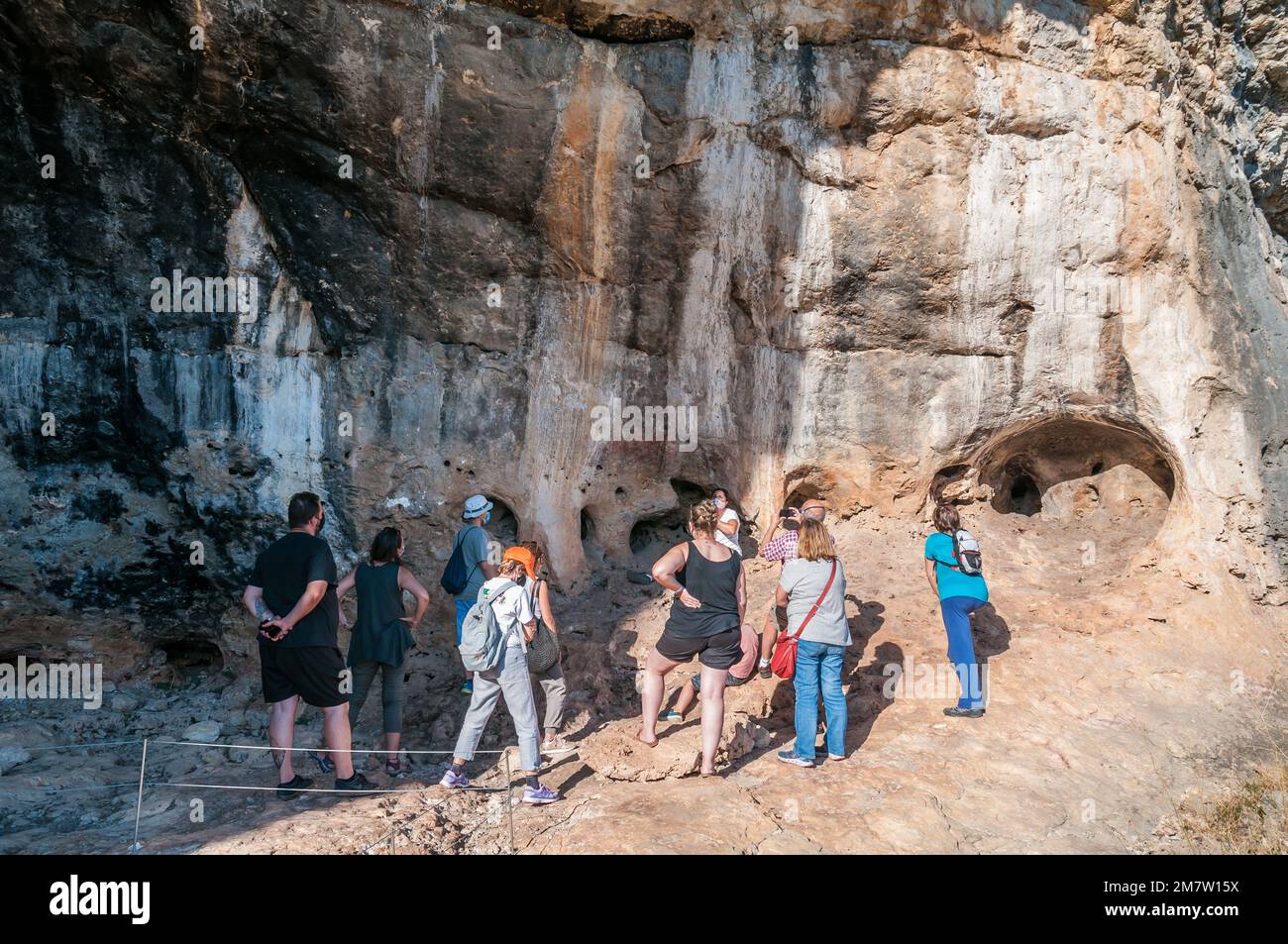 people visiting cave paintings of Abrics de l'Ermita, the most ...