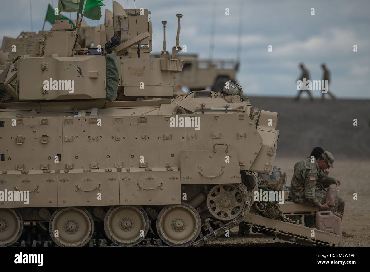 Soldiers from Charlie Company, 2-116th Combined Arms Battalion work to ...