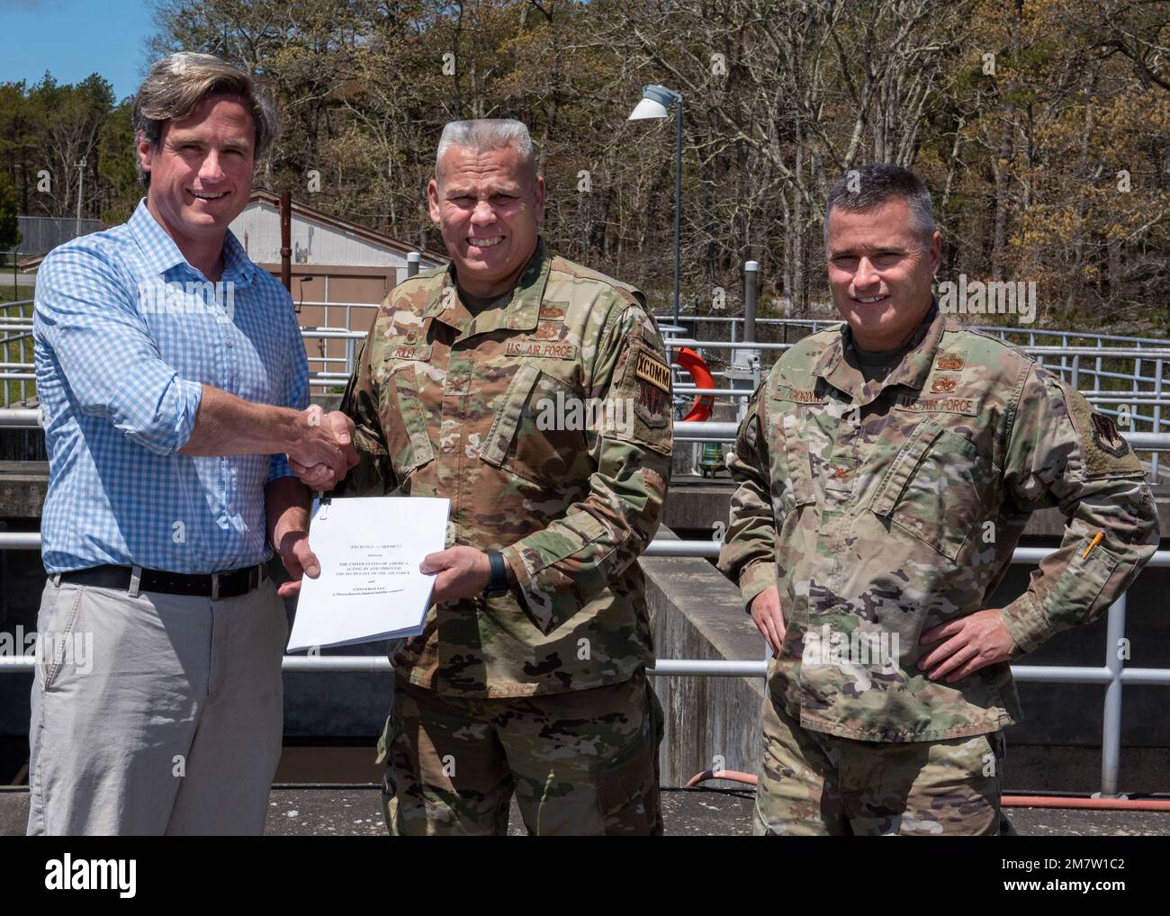 Converge LLC founder and Managing Partner, Matthew Kennedy shakes hands ...