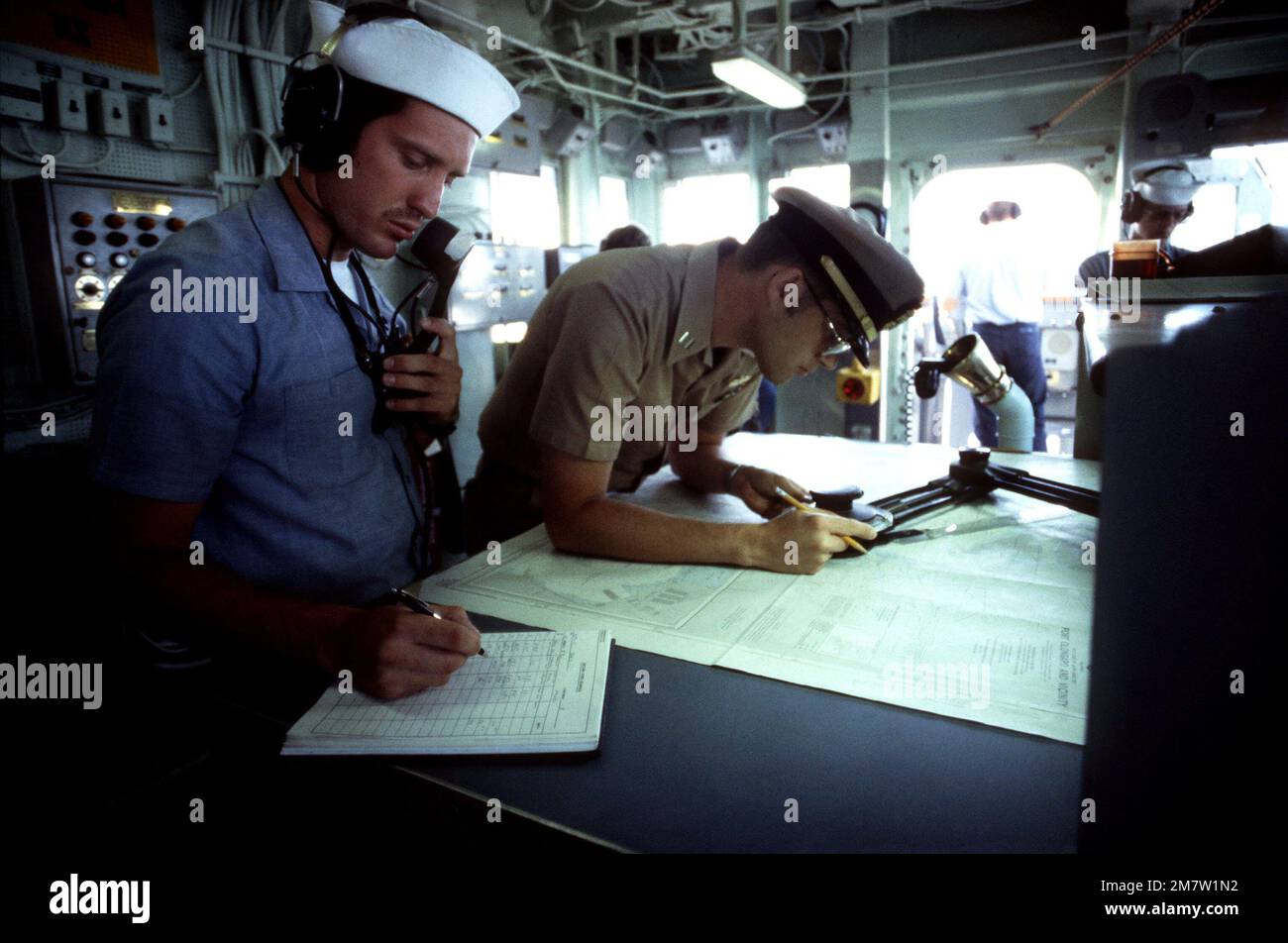 Quartermaster 3rd Class (QM3) Ray B. Ortega and Lieutenant J. W. Sweet ...