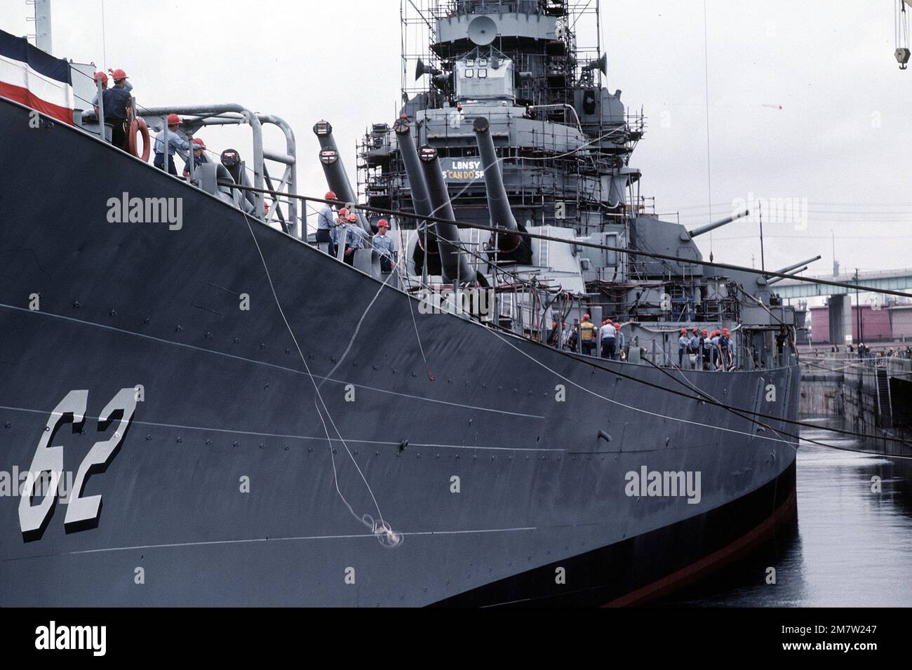 Port bow view of the battleship NEW JERSEY (BB-62) afloat in drydock ...