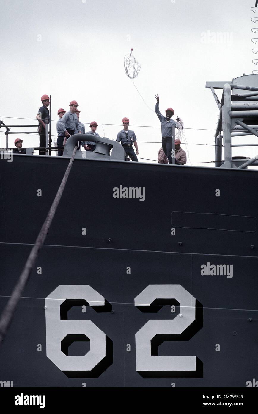 A member of a deck crew aboard the battleship NEW JERSEY (BB-62 ...