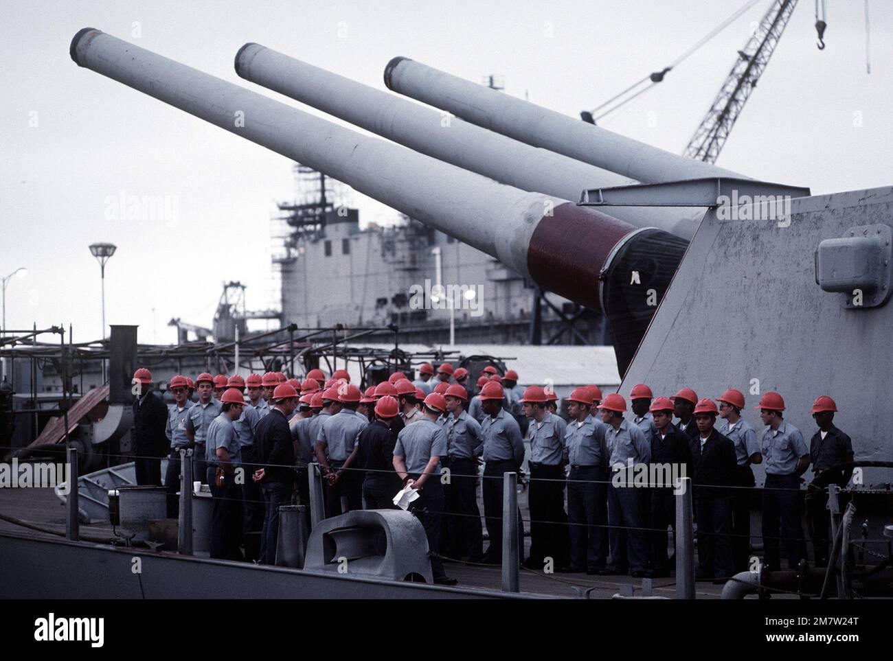 Navy deck crew members are briefed here as the battleship NEW JERSEY ...