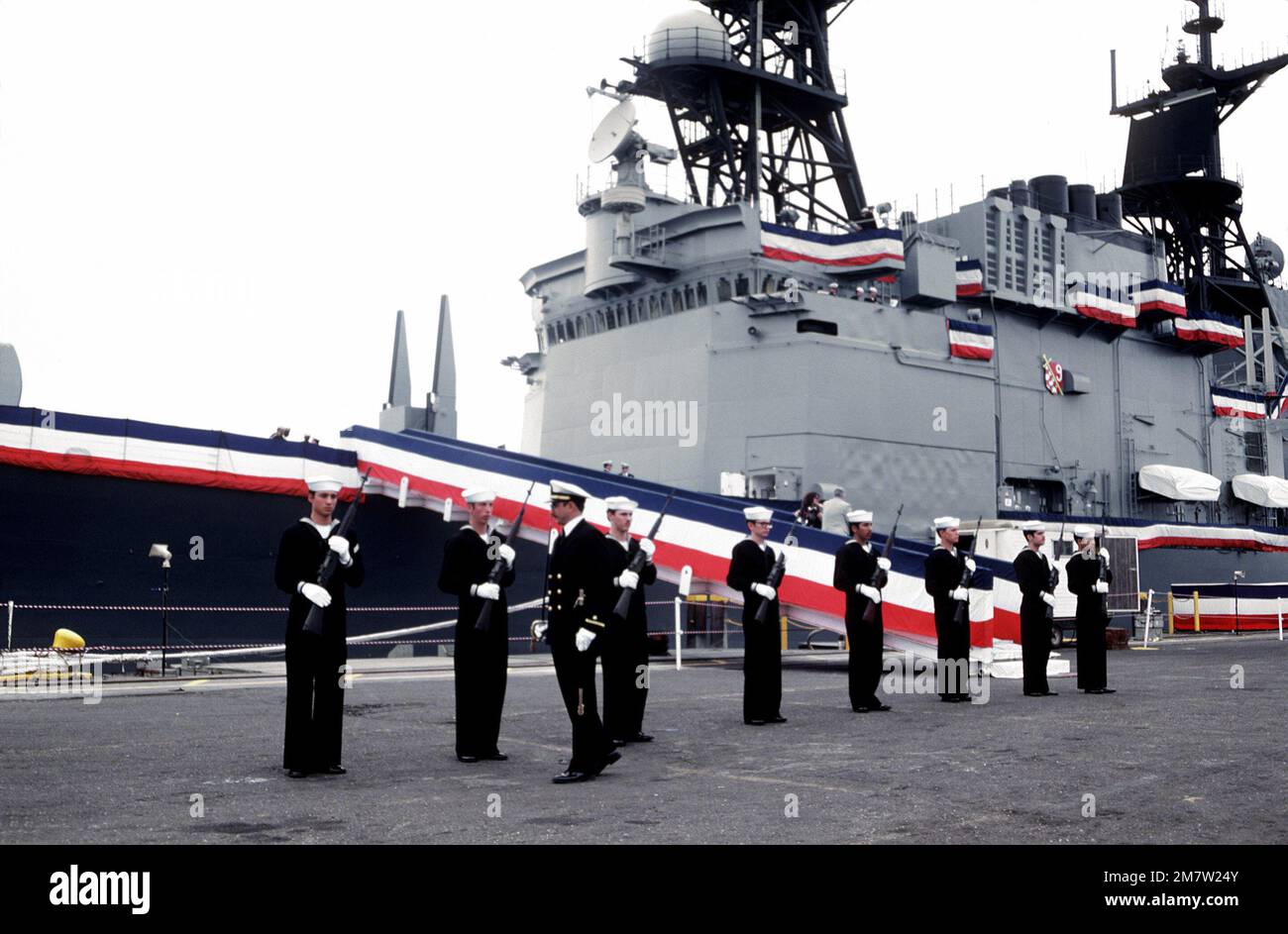 ENS Don Schultz inspects the honor guard prior to the beginning of the ...